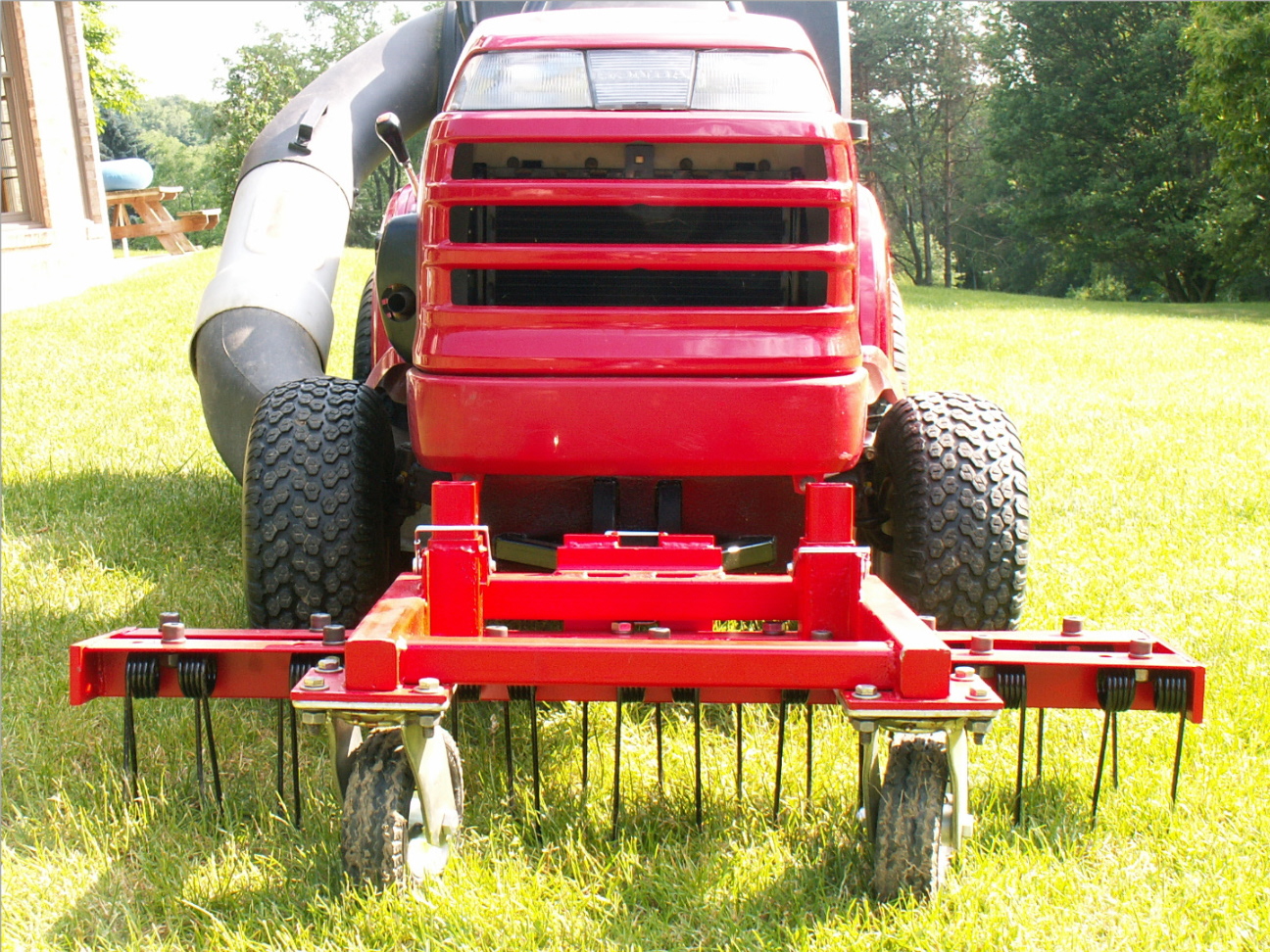 Home made front mounted dethatcher TractorByNet
